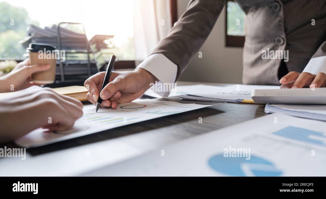 Two businessmen discussion analysis sharing calculations about the ...