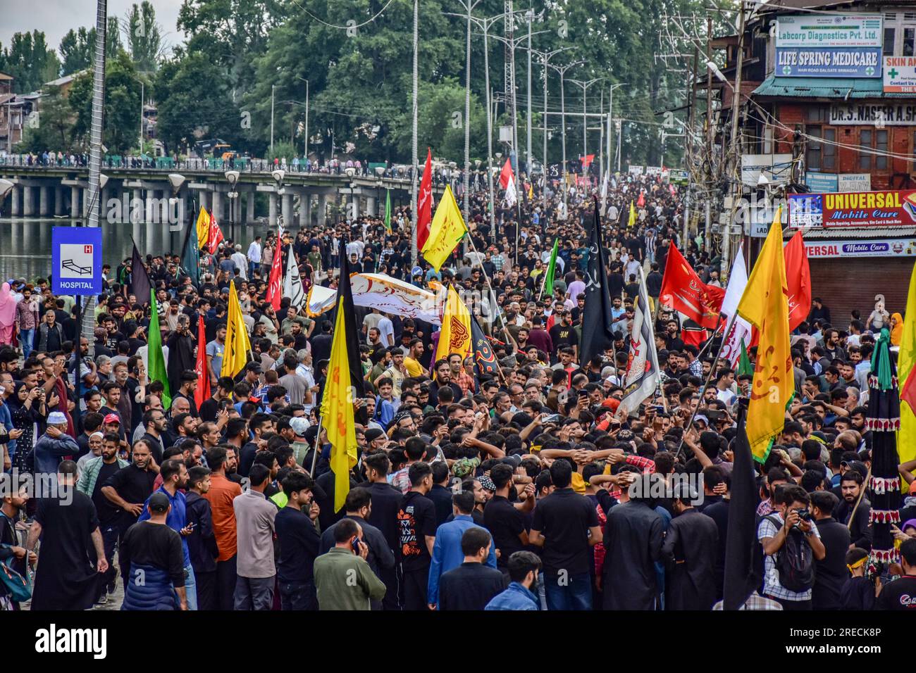Srinagar, India. 27th July, 2023. Kashmiri Shiite Muslims take part in a religious procession ...