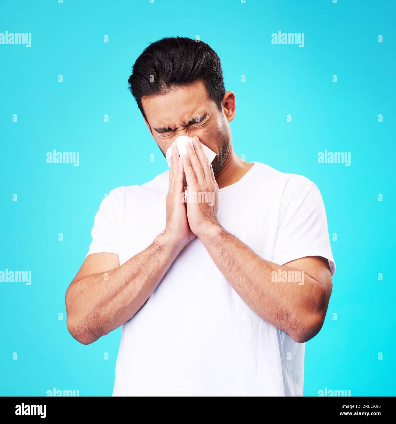 Tissue, nose and man in studio for sick allergy, cold and influenza on ...