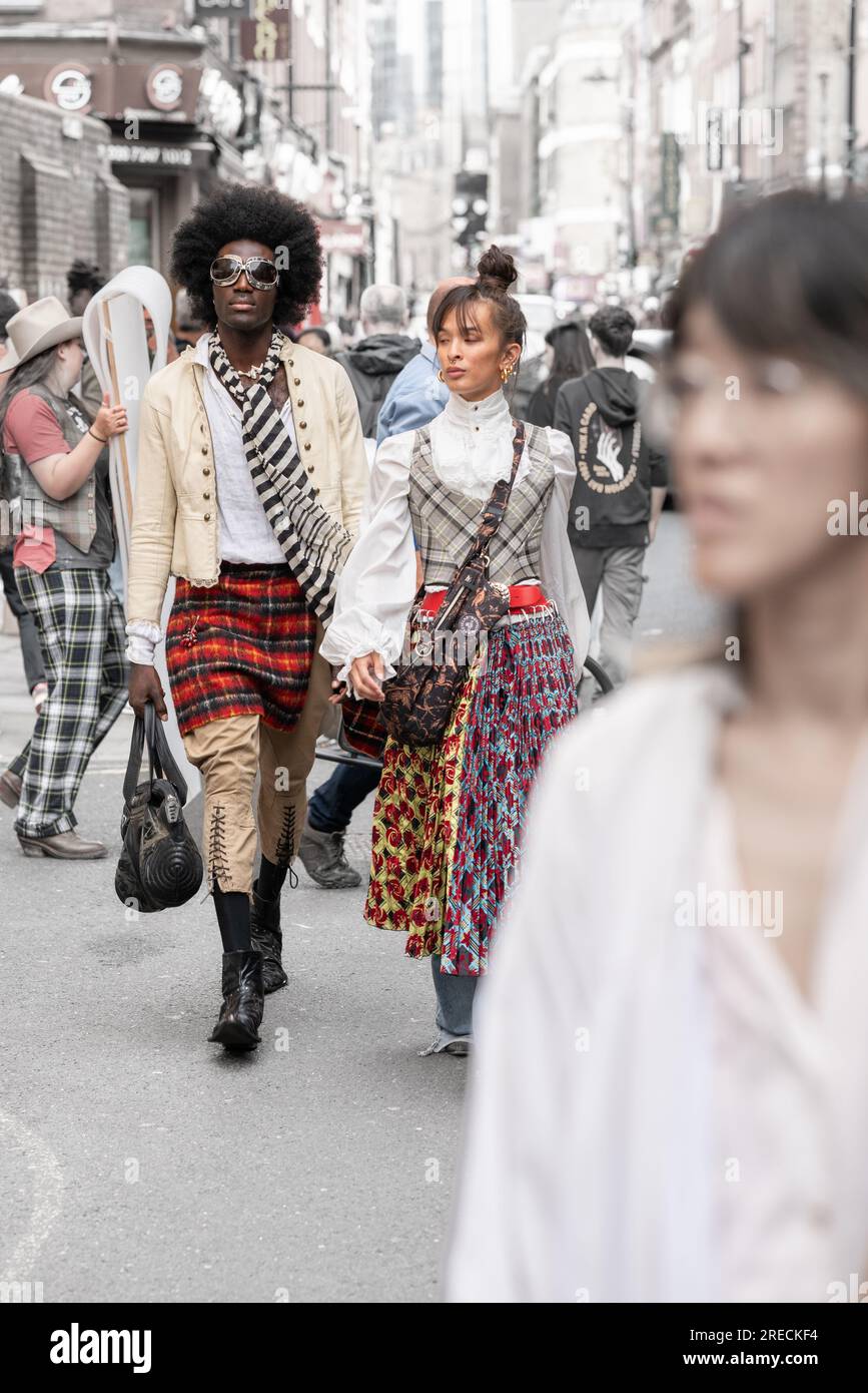 Two fashionable people in London, England, UK Stock Photo - Alamy
