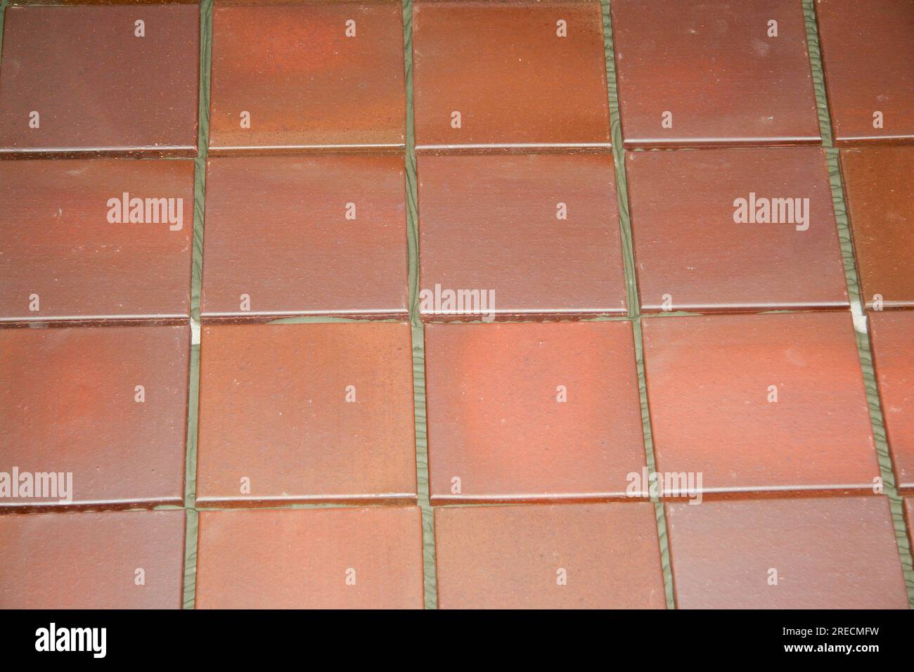 Newly laid reddish brown floor tiles in a makeover at the Crown Hotel ...