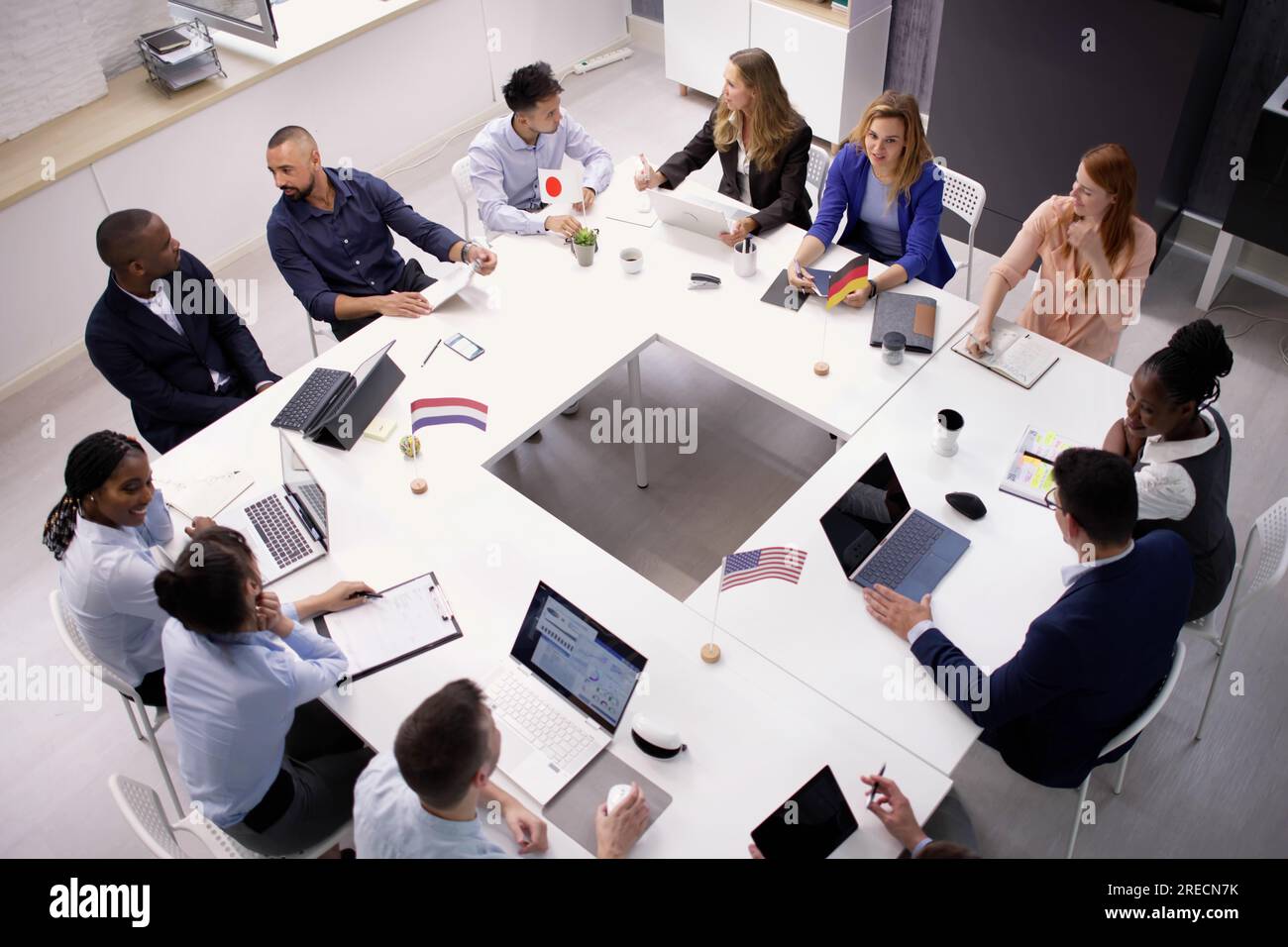 American flags conference hi-res stock photography and images - Alamy