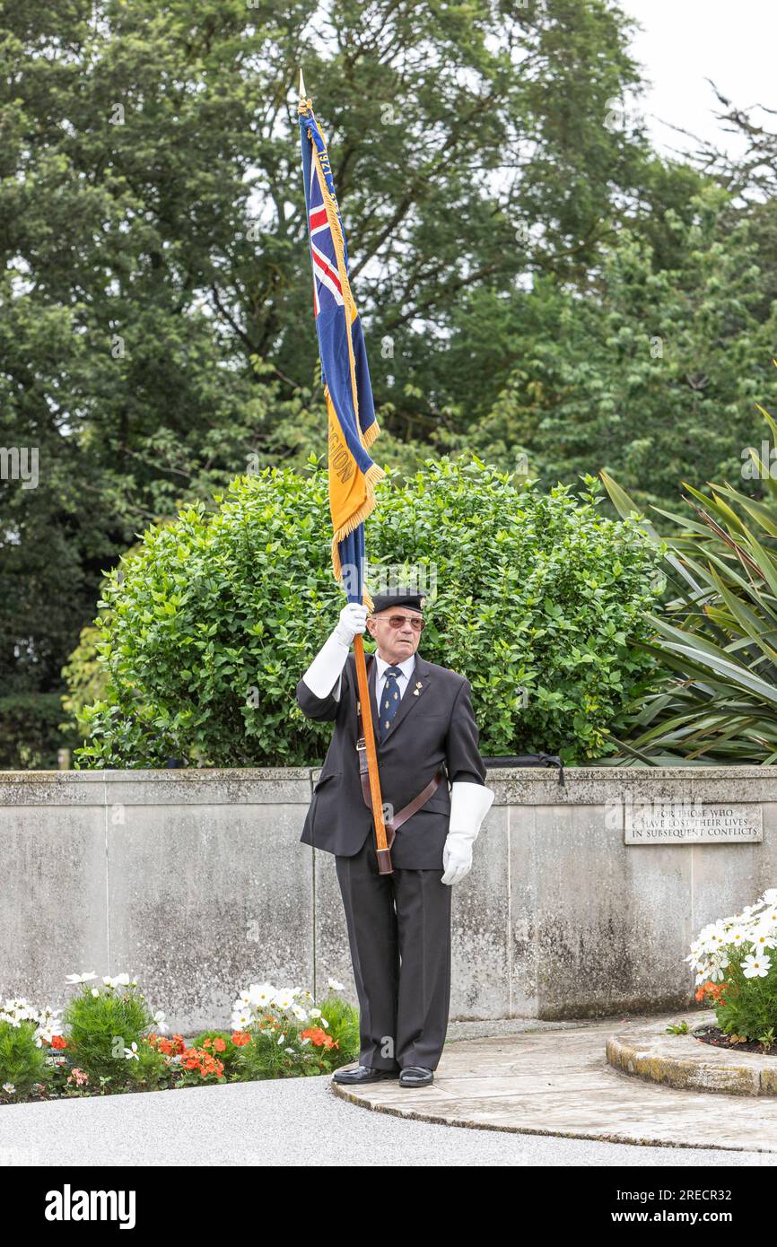 A standard bearer at Hythe War Memorial for Victory in Korea Day, July ...