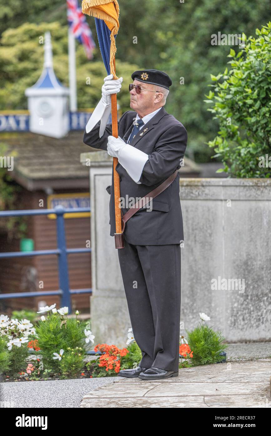 A standard bearer at Hythe War Memorial for Victory in Korea Day, July ...
