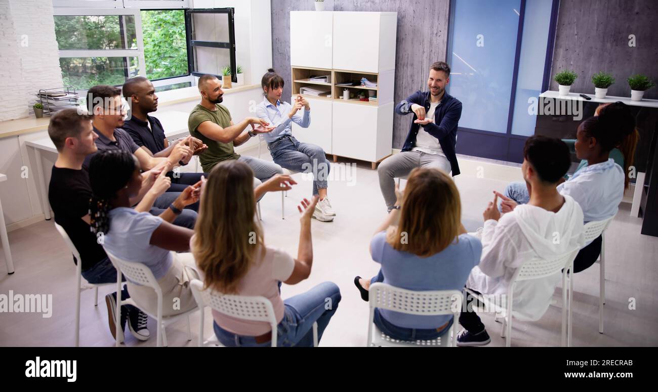 Sign Language Class For People With Disability Stock Photo - Alamy