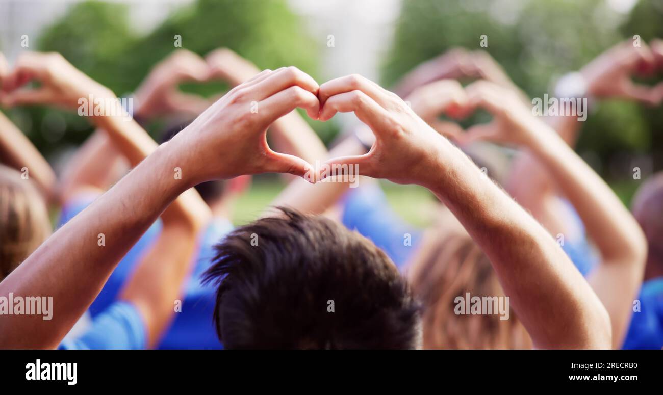 Diverse Young Charity Group Making Hearts Using Hands Stock Photo - Alamy