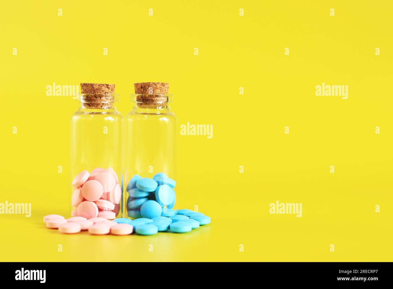 Vitamin B complex, tablets, dietary supplement. A set of blue and pink ...