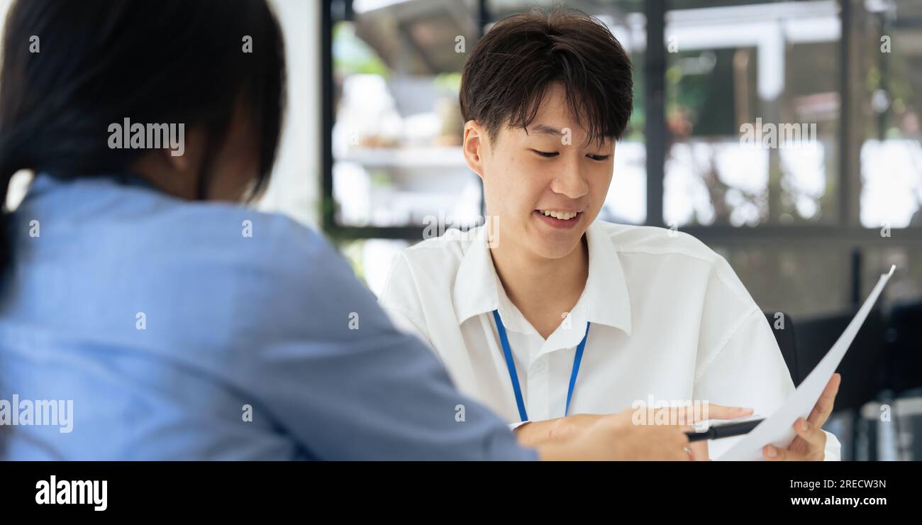 employee discuss business income report together in the office Stock ...
