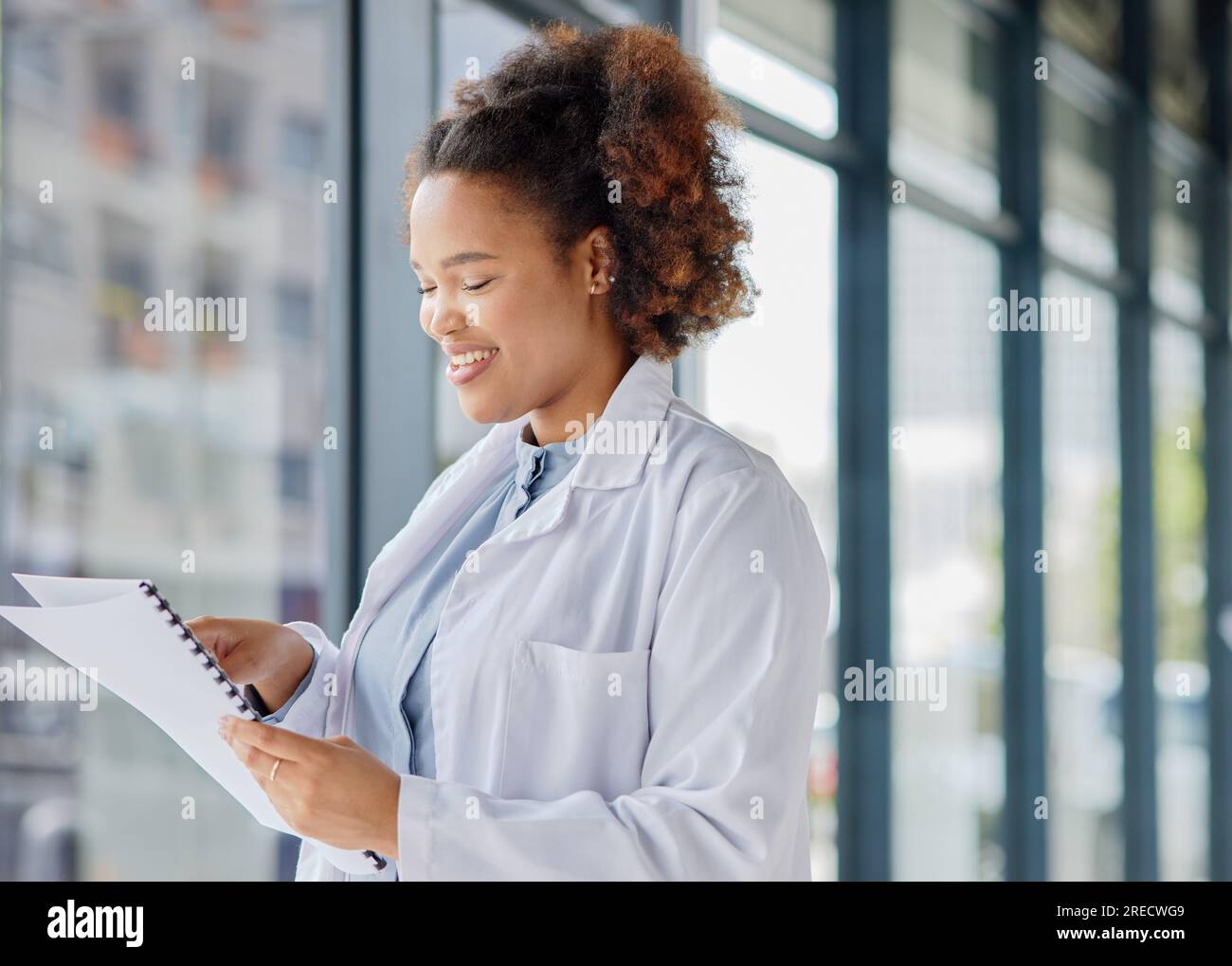 Woman, doctor and reading healthcare documents for hospital ...