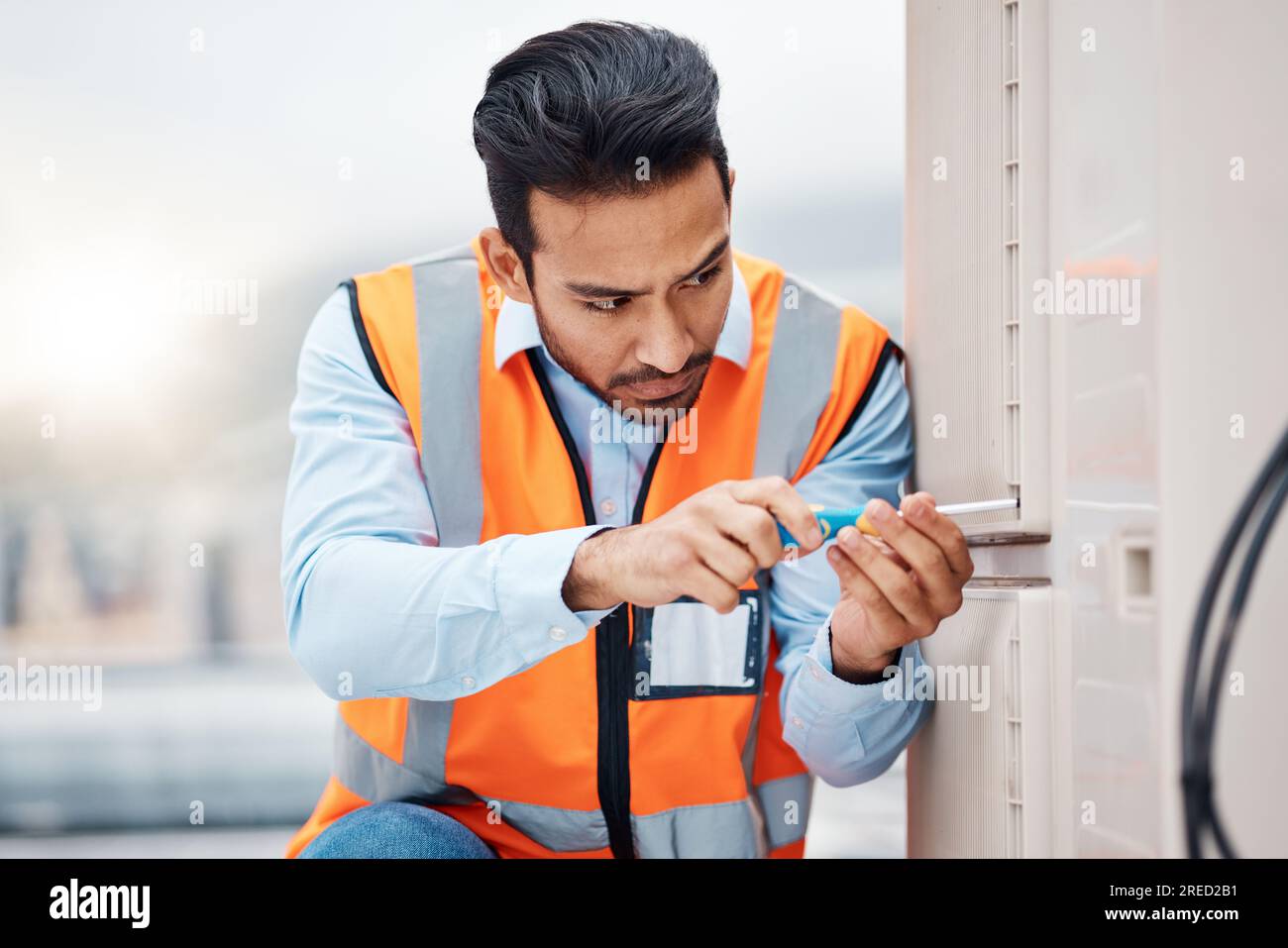 Tools, engineering and man with air conditioner for maintenance, repair ...
