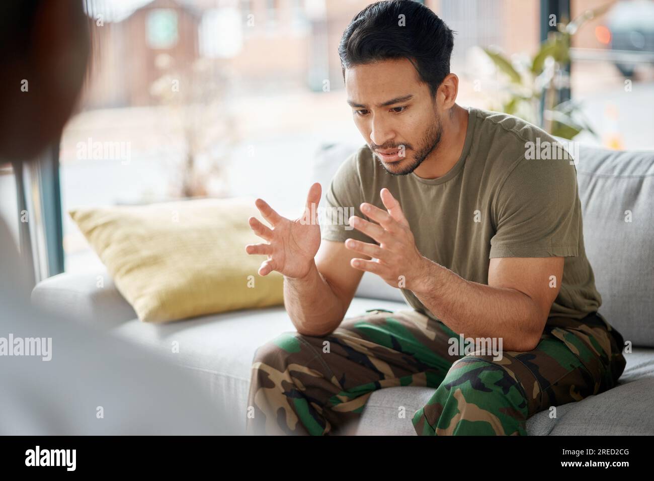 Therapist, soldier and man talking, support and counseling for military trauma, mental health ...