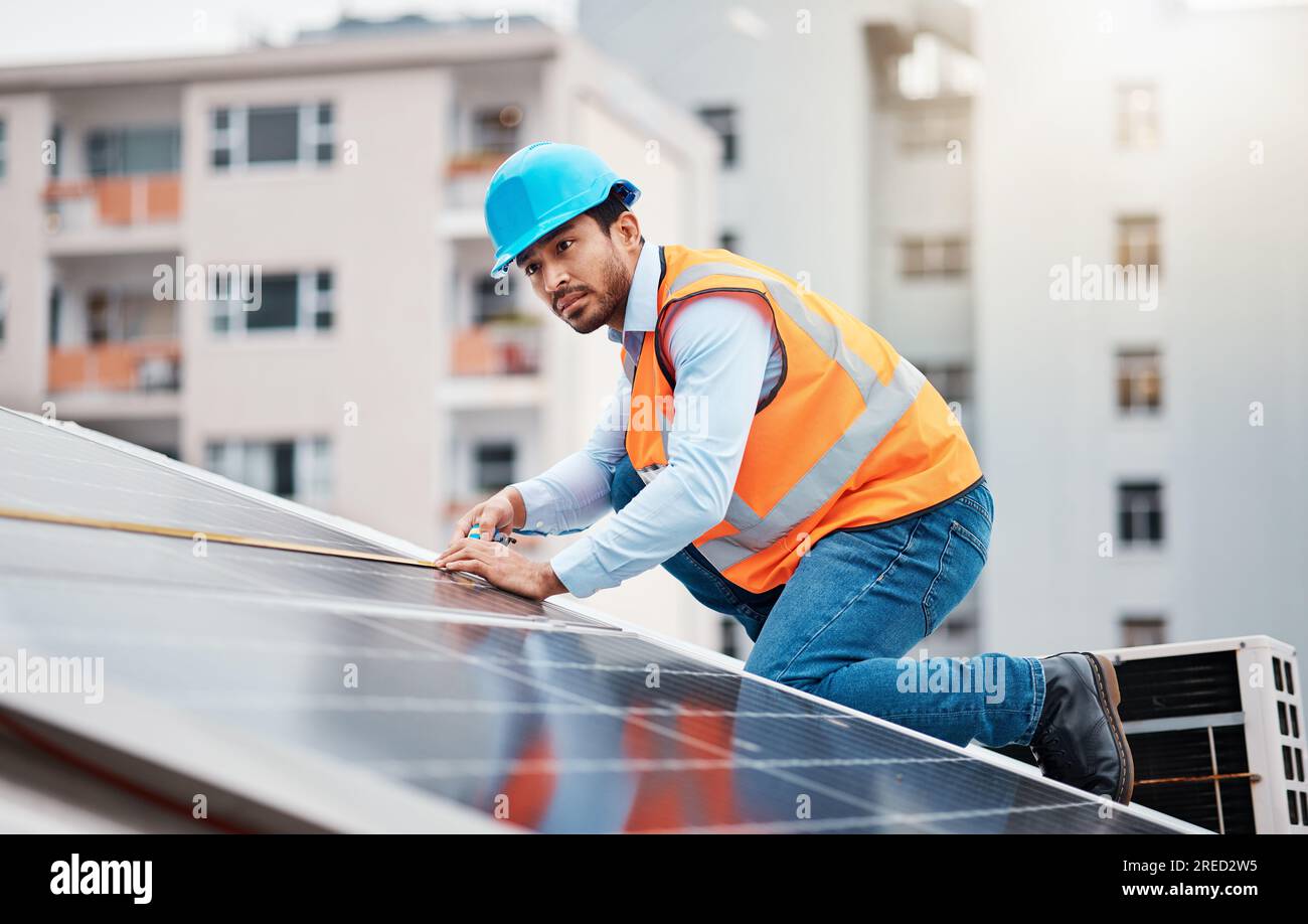 Technician man, tape and solar panel on roof with thinking, sustainable ...