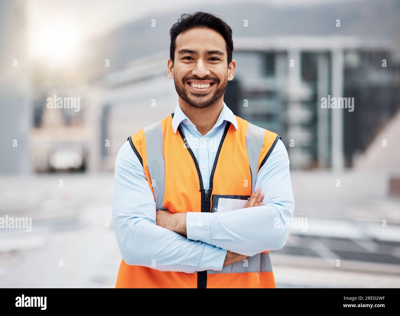 Portrait, construction worker and man smile with arms crossed with ...