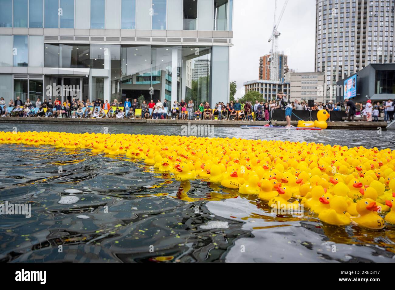 London, UK. 27 July 2023. The public watches one thousand ducks in a ...