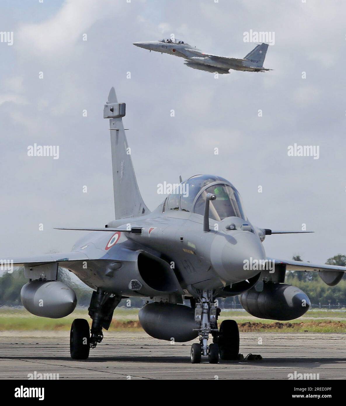 A Rafale fighter (front) from the French Air and Space Force takes part ...