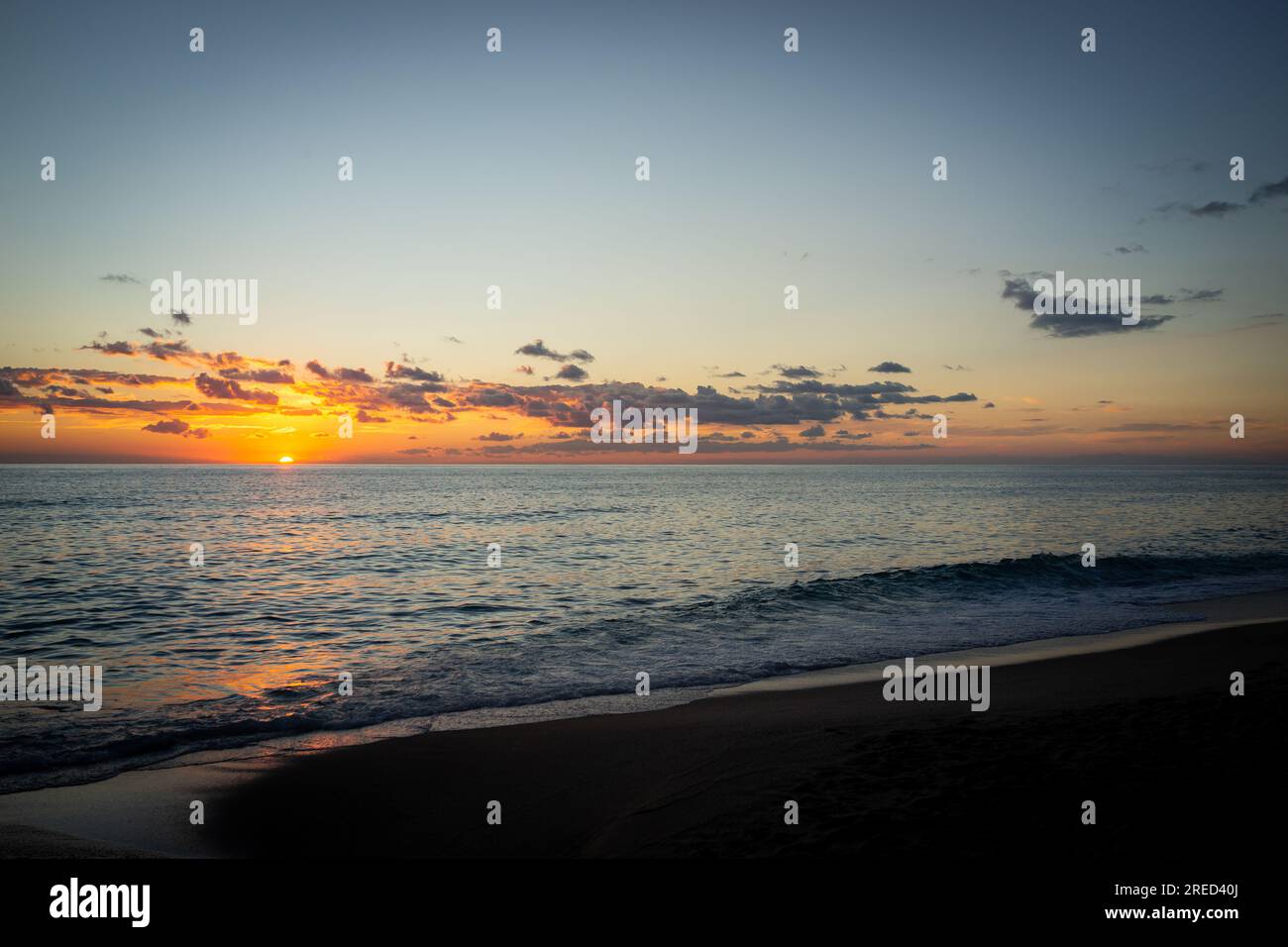 Beautiful summer beach sunset sky and clouds Stock Photo - Alamy