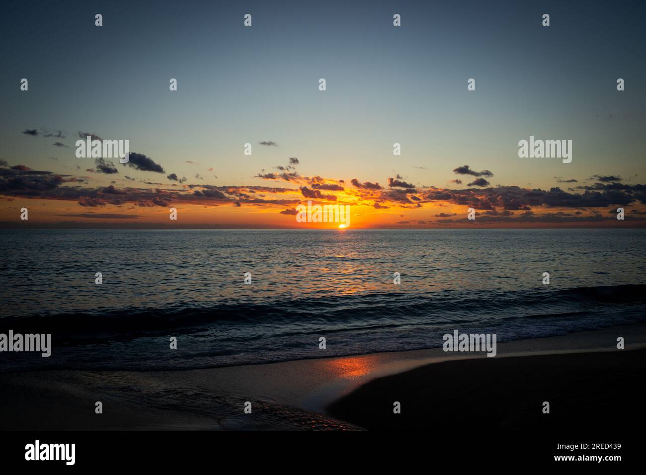 Beautiful summer beach sunset sky and clouds Stock Photo - Alamy