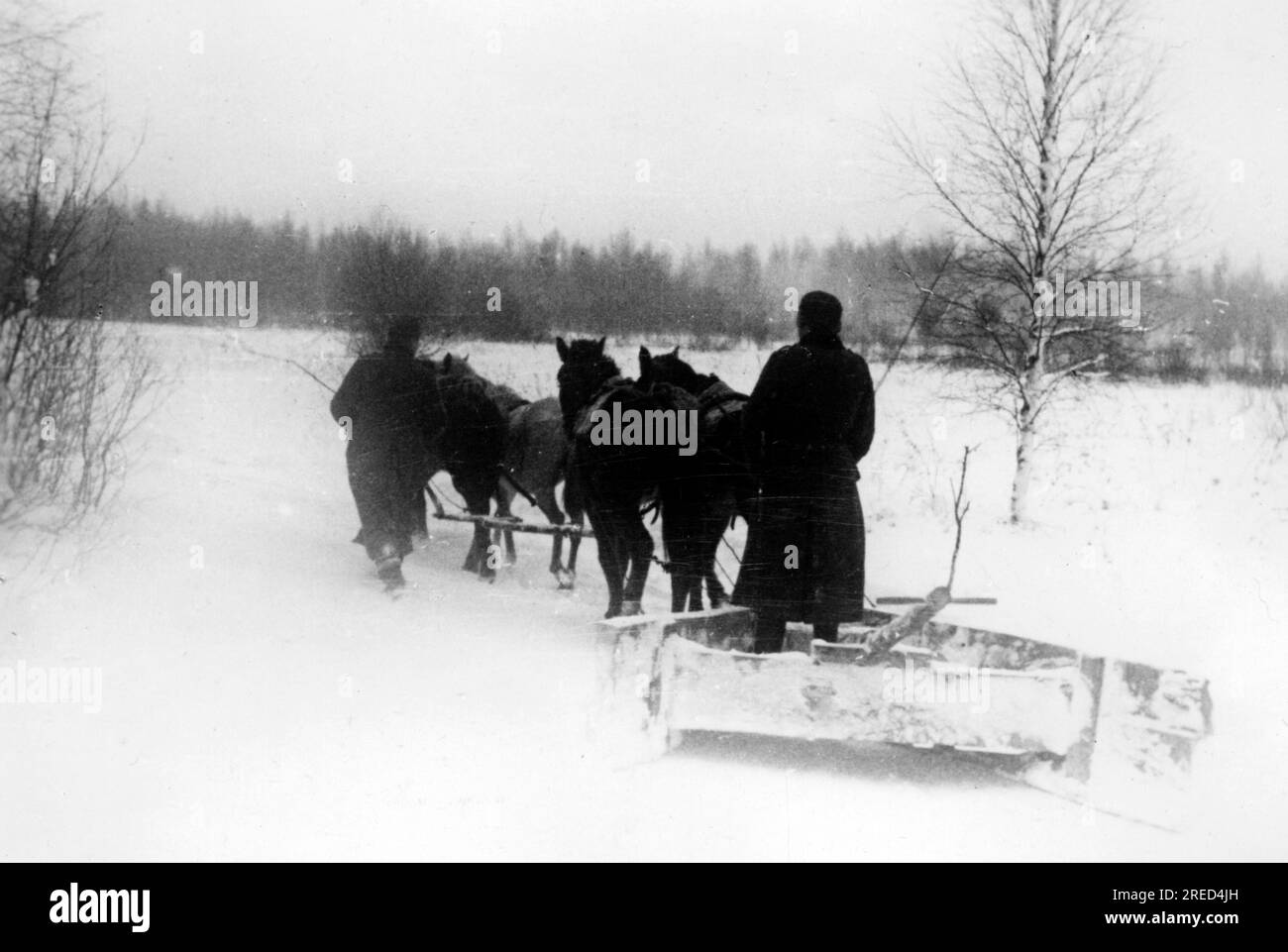 Snowplow on a road Black and White Stock Photos & Images - Alamy