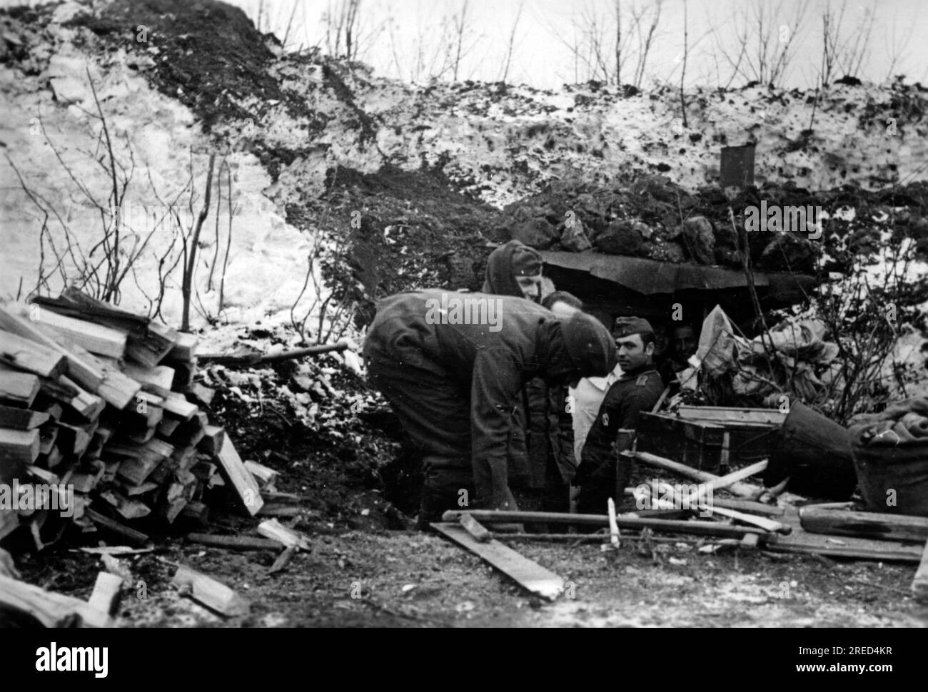 German soldiers in front of their earth bunker near Kaganovicha on the ...