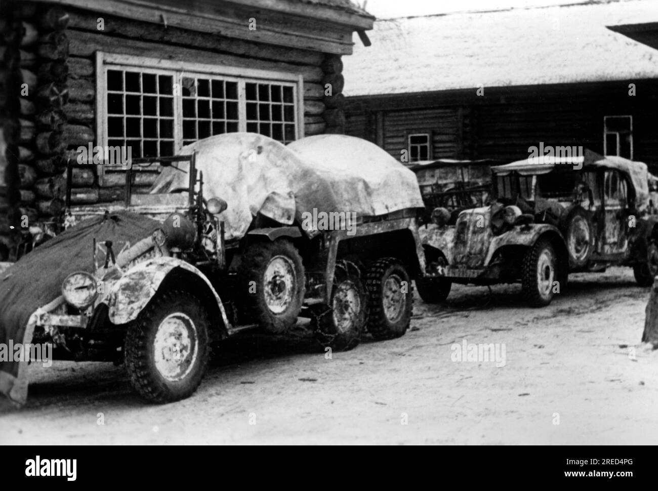 German vehicles in a town in the central section of the Eastern Front ...