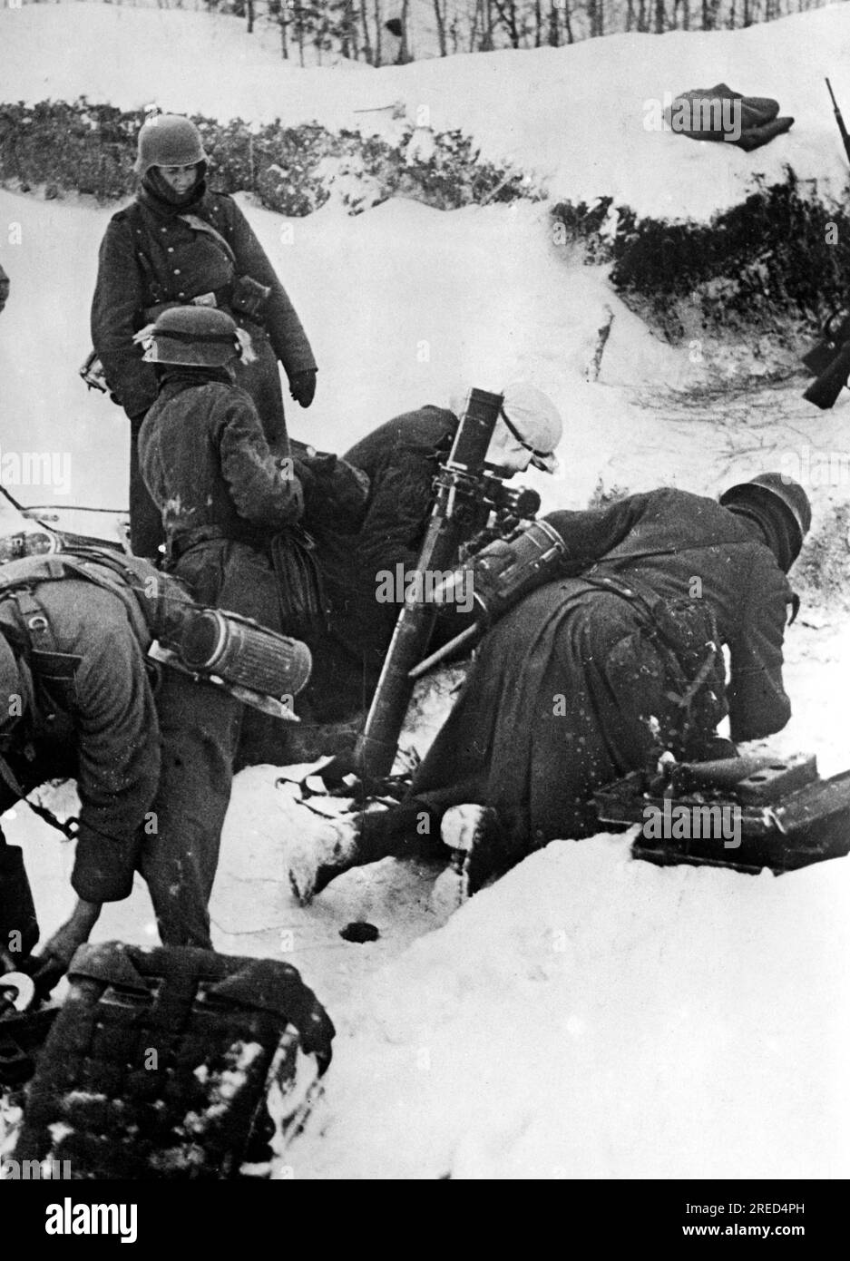 German soldiers fire at Russian positions with a shell launcher. Photo ...
