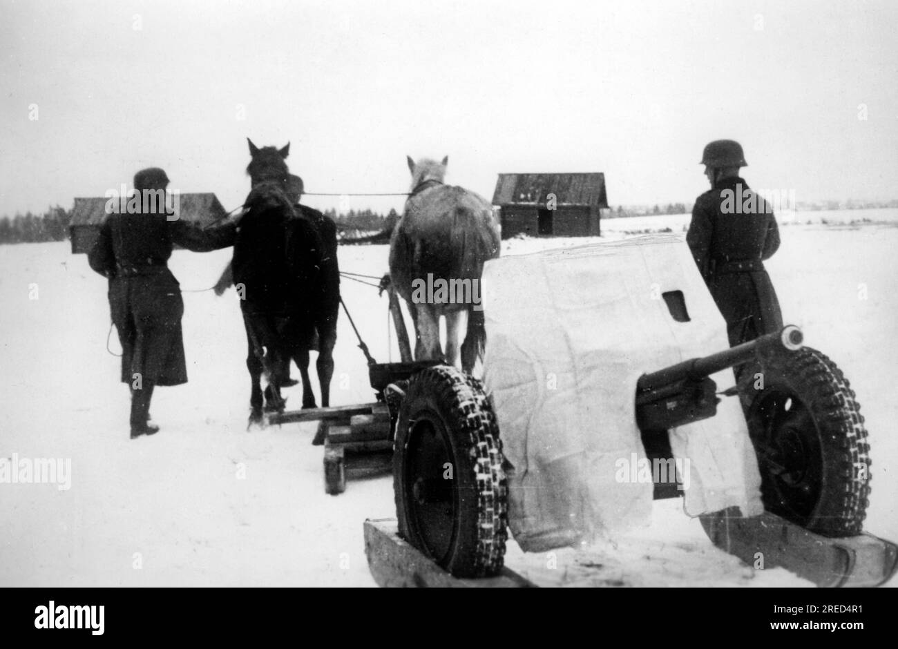 German soldiers pulling a 3.7cm Pak 36 on skids. Photo: Maltry ...