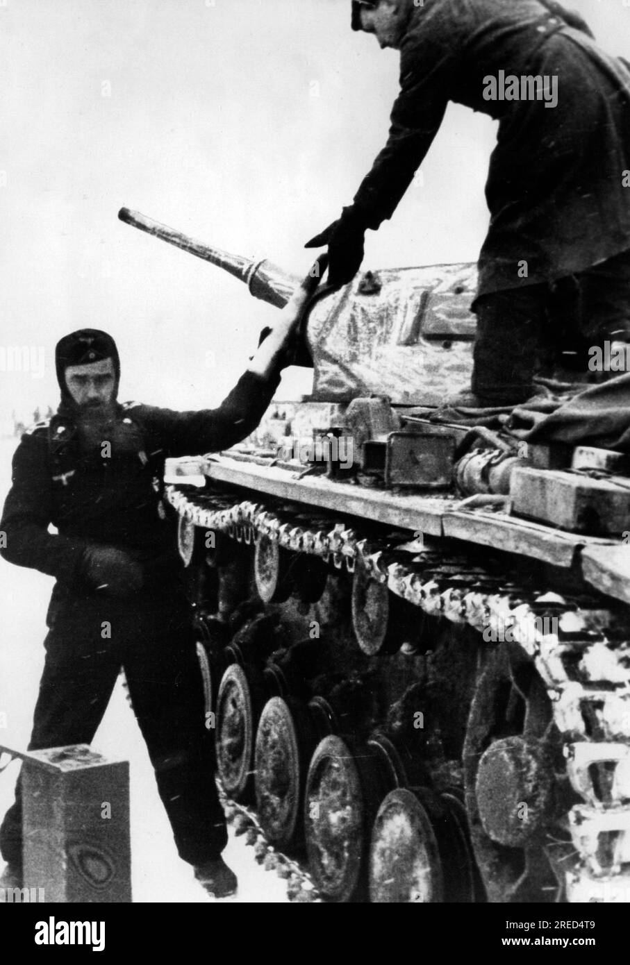 German soldiers ammunition their Panzer III. Photo: Tannenberg ...