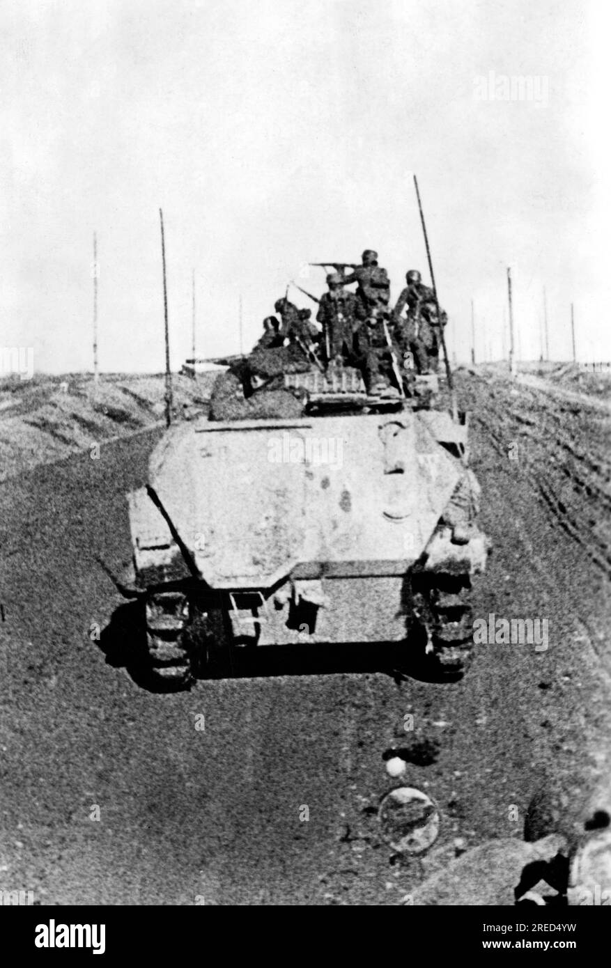 Russian troops are taken under fire from a column. In the foreground an ...