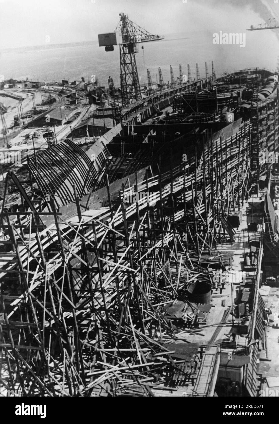 A Russian battleship lying in a shipyard in captured Nikolayev, Ukraine ...