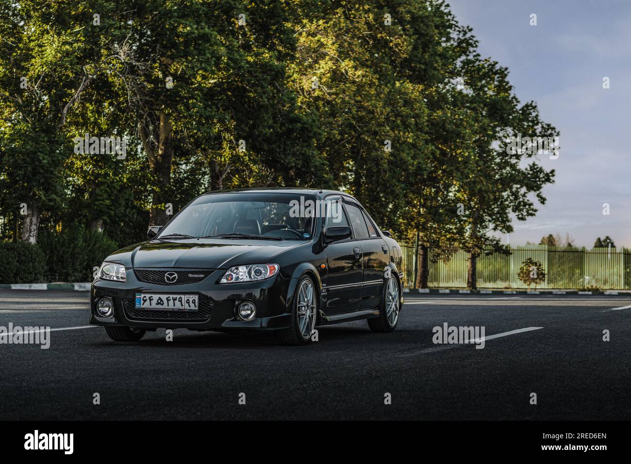 black mazda 323 speed protege Stock Photo - Alamy