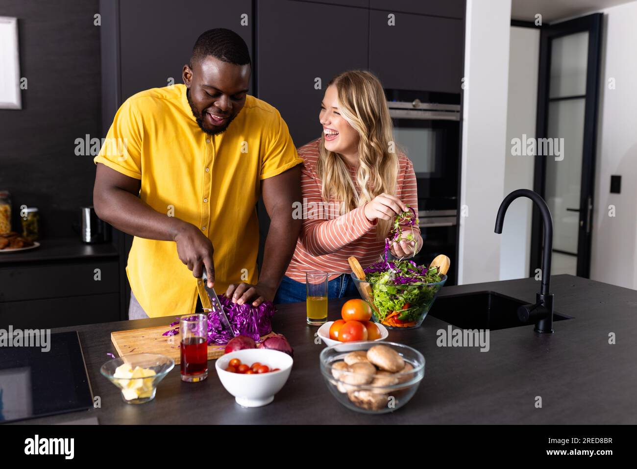 Happy diverse friends cutting hi-res stock photography and images - Alamy