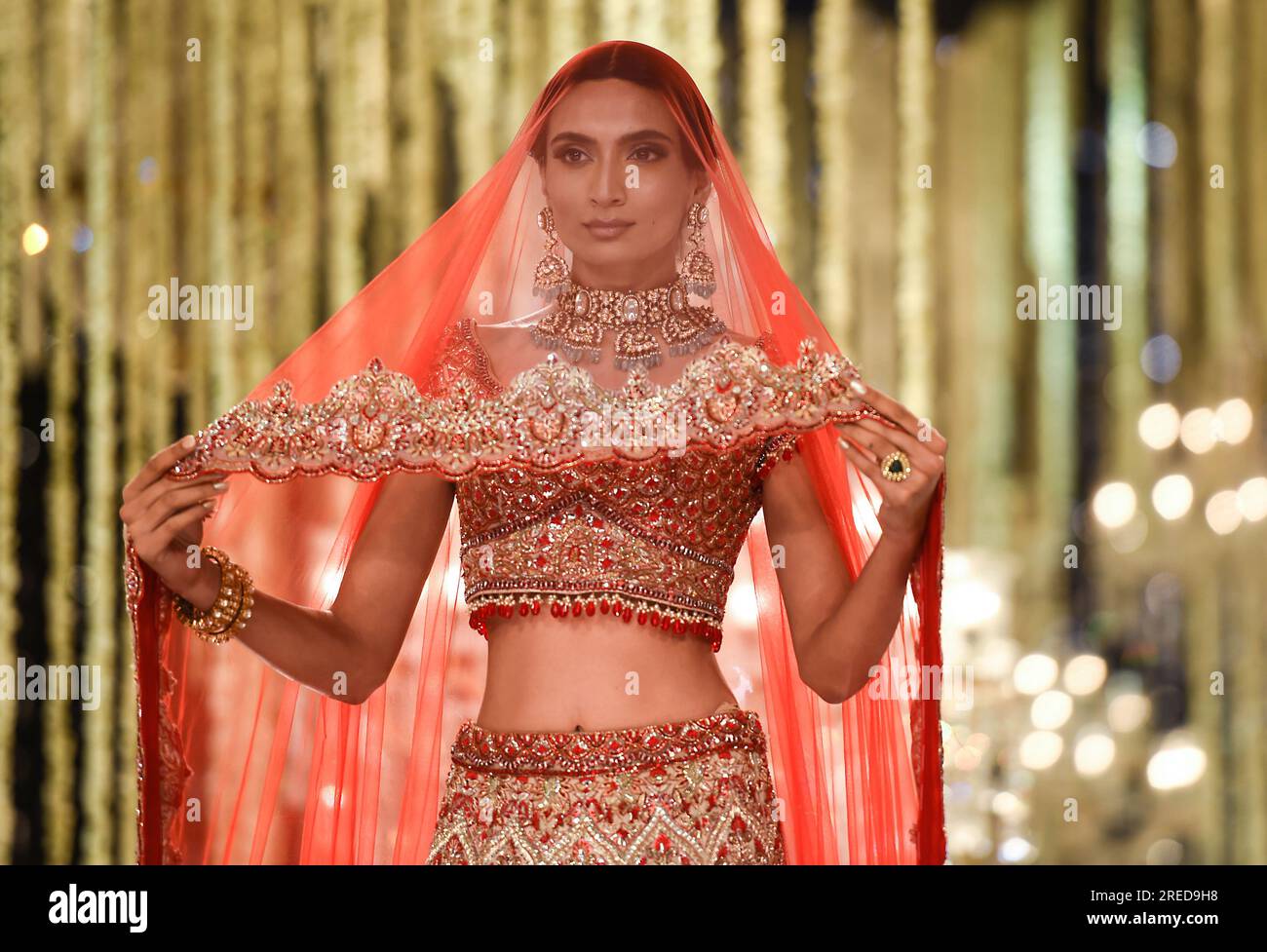 New Delhi, India. 26th July, 2023. A model displays a creation by ...