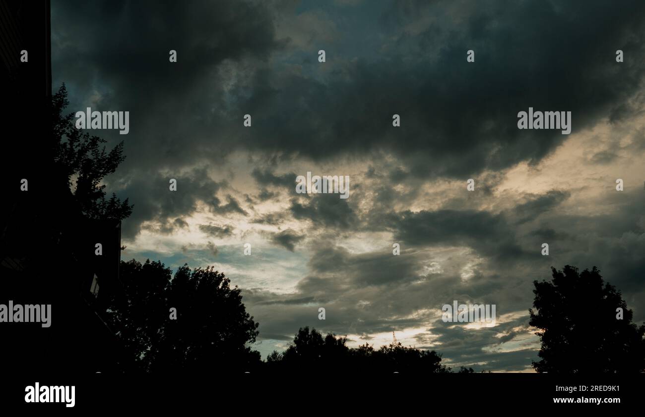 Dark brooding clouds fill the sky Stock Photo - Alamy
