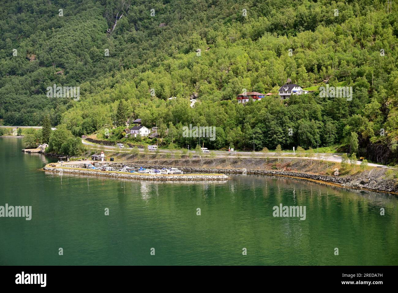 European route E16 highway follows the shore of the Aurlandsfjorden at ...