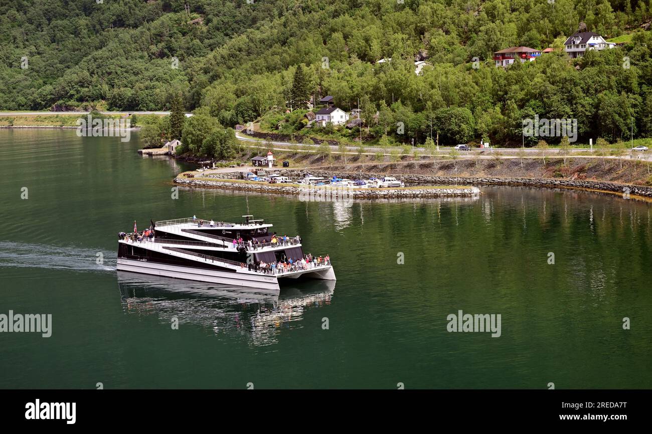 European route E16 highway follows the shore of the Aurlandsfjorden at ...