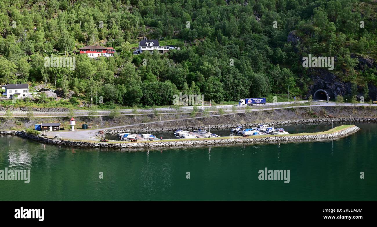 European route E16 highway follows the shore of the Aurlandsfjorden at ...