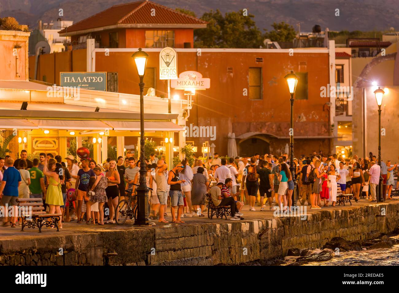 CRETE, GREECE - JULY 03 2023: Crowds of tourists gather at restaurants ...