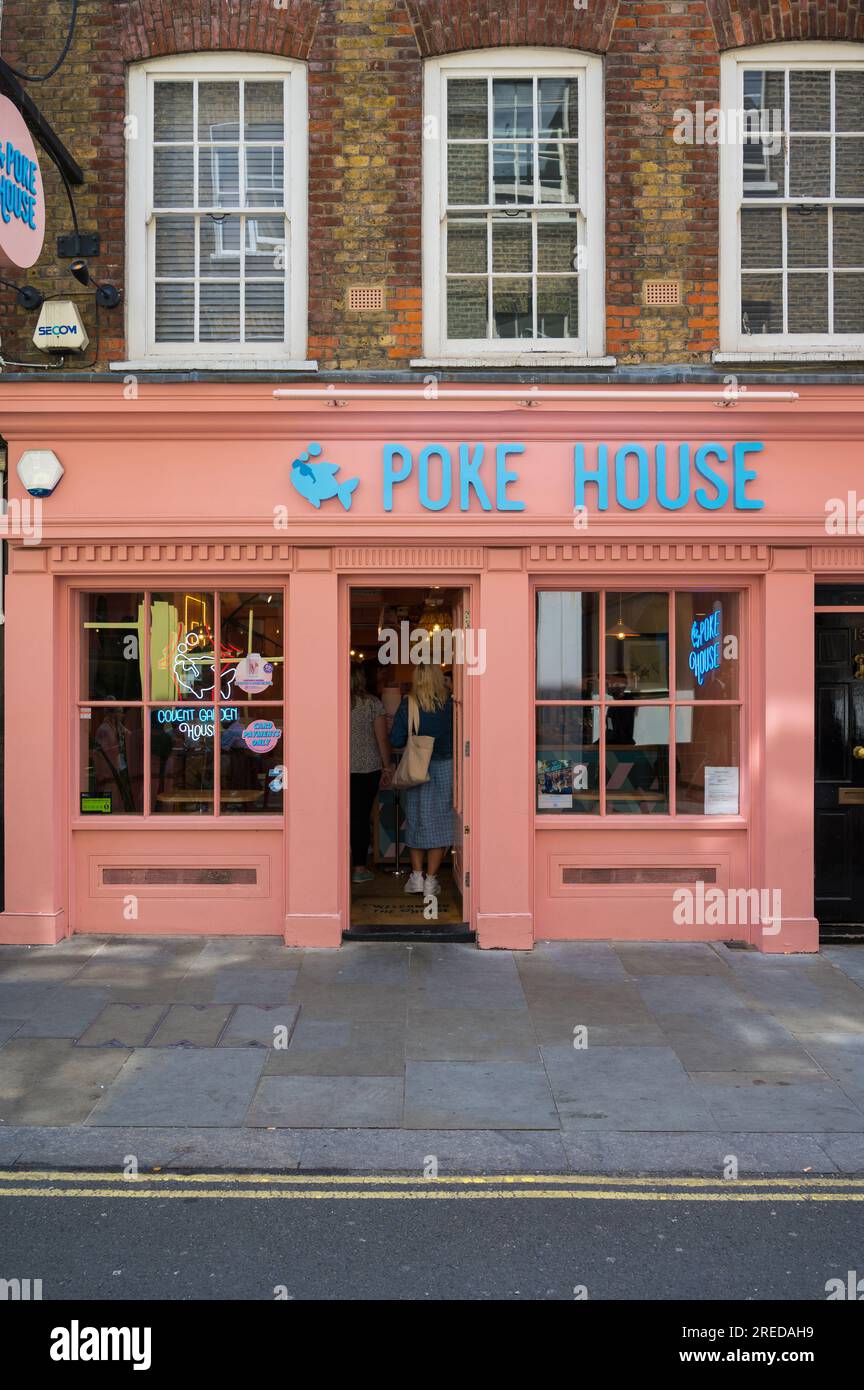 People buying food at the Poke House Hawaiian restaurant. New Row ...