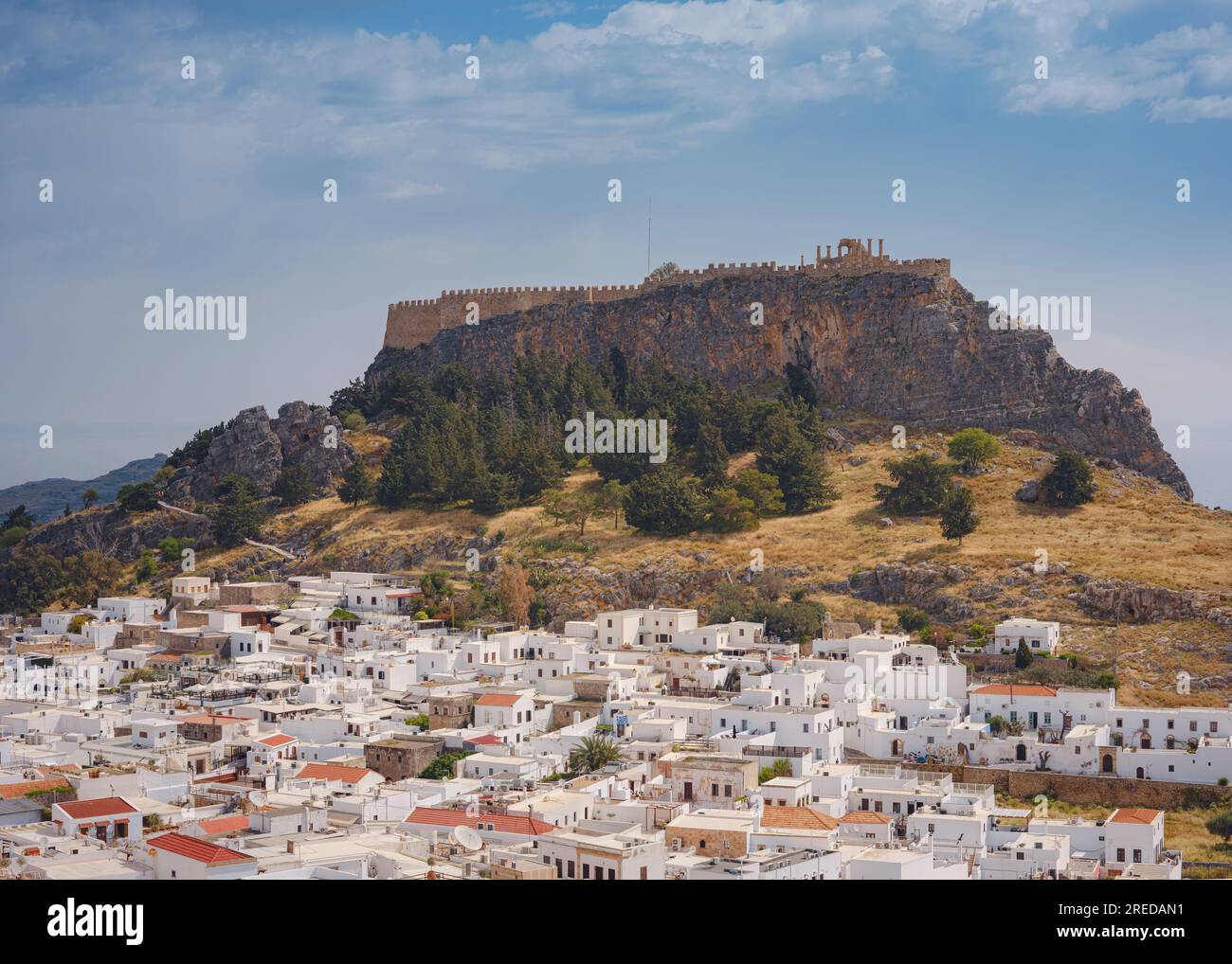 Lindos town in Greece aerial view in cloud summer day, white houses in ...