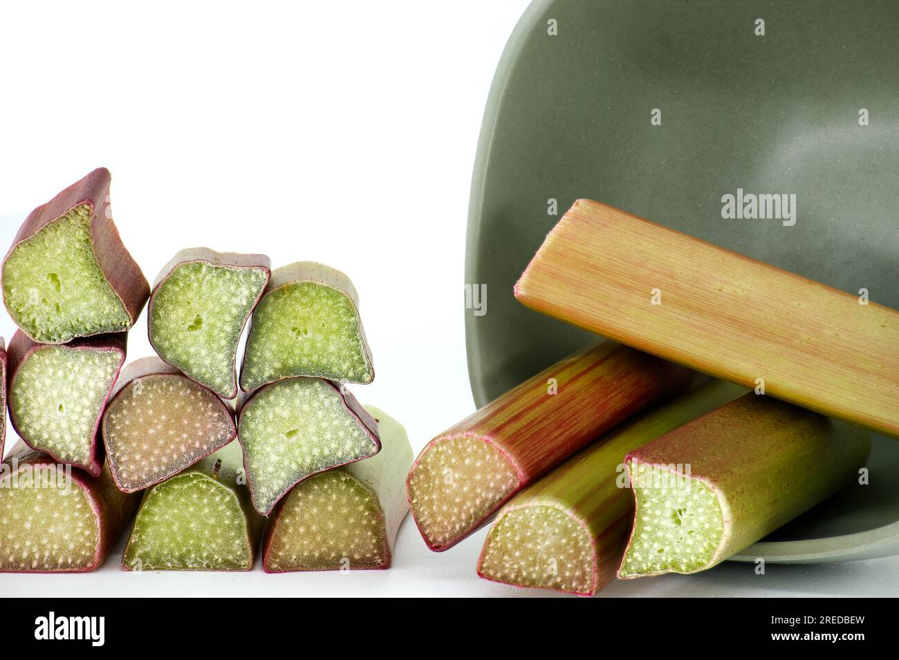 Variety of rhubarb stalks of varying colors from pale green to deep red ...