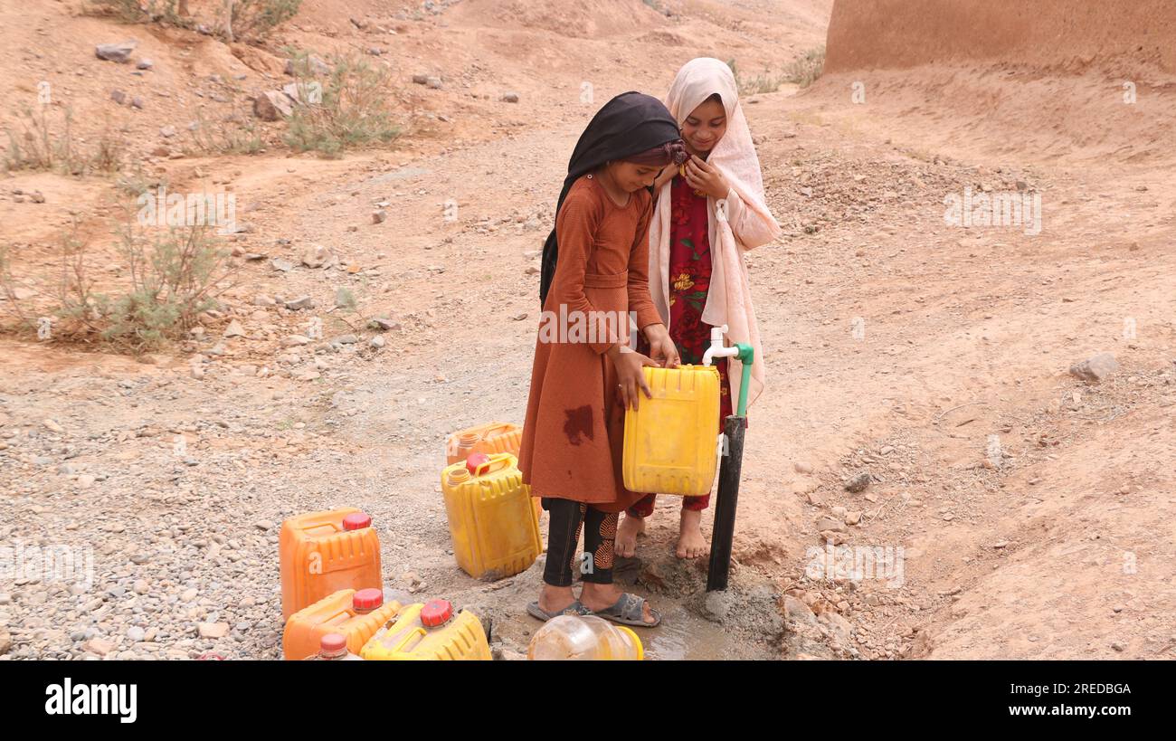 Farah, Afghanistan. 26th July, 2023. Girls fetch water from a public ...