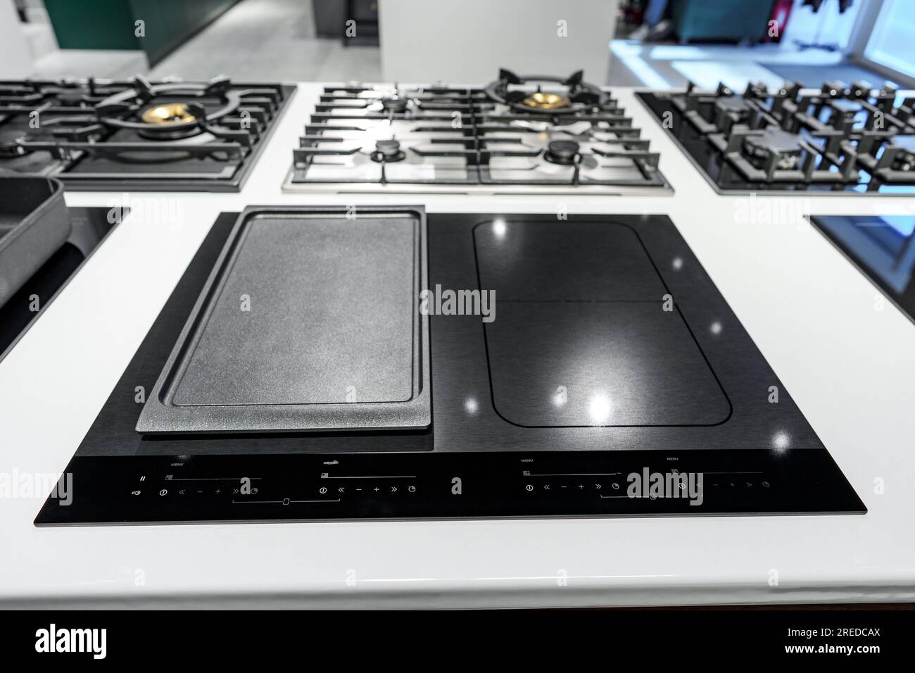 Modern cooking stoves on display in the store Stock Photo - Alamy