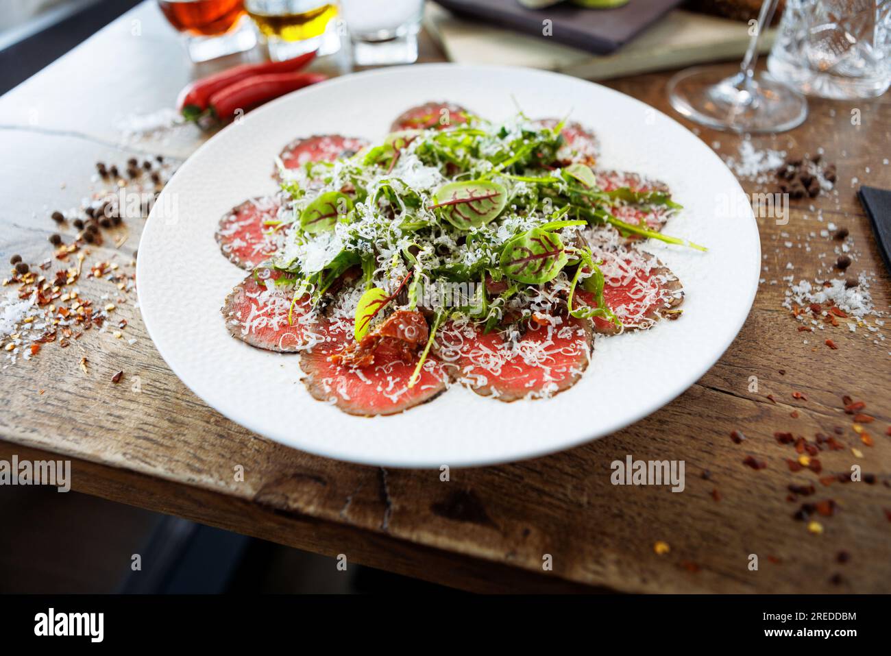 Beef carpaccio. Borettane onion, sun-dried tomato, truffle dressing ...
