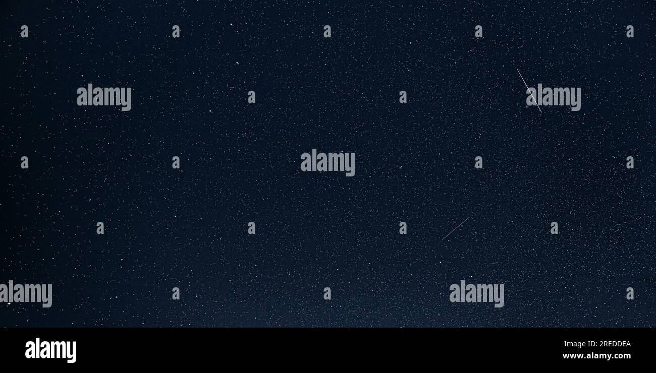 Night Starry Sky. Glowing Stars And Meteoric Tracks Trail In Dark Night ...