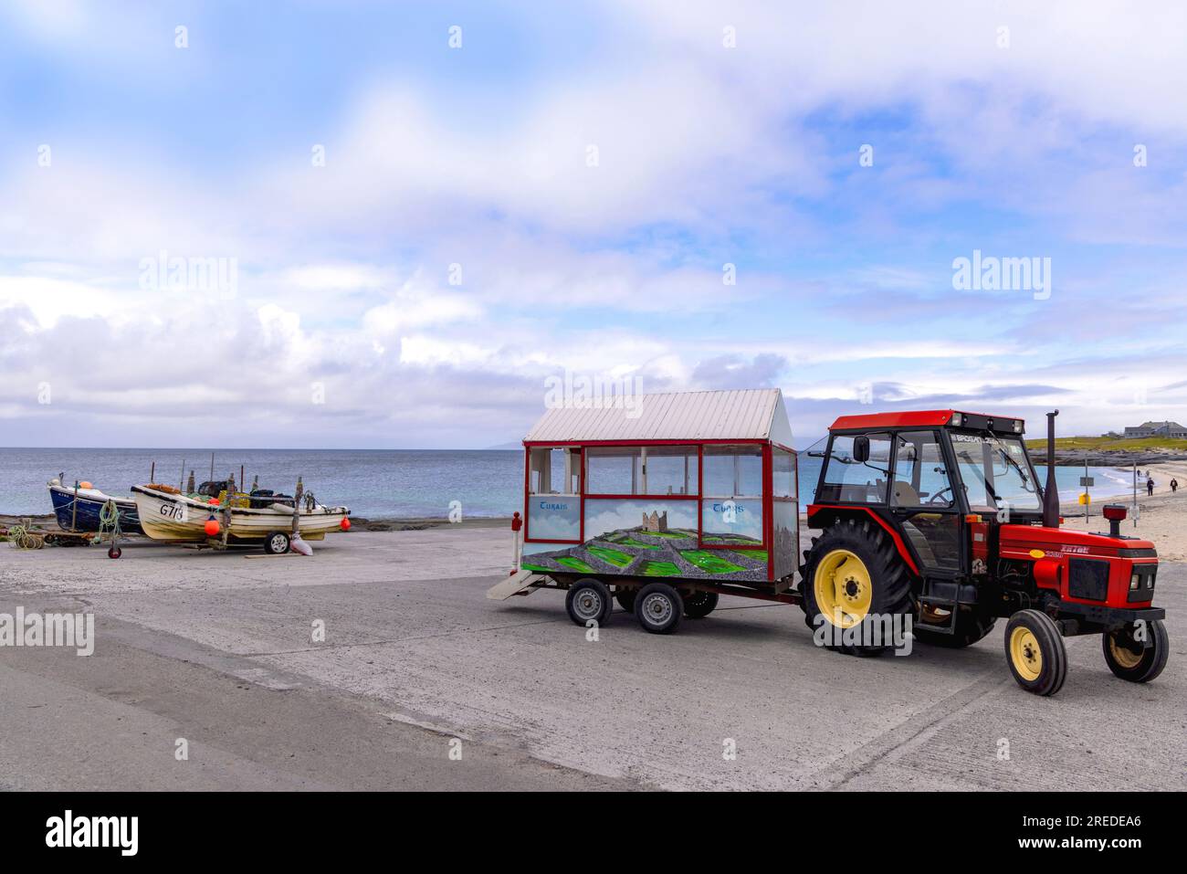 A tractor-drawn carriage awaiting tourists for a guided tour across the ...