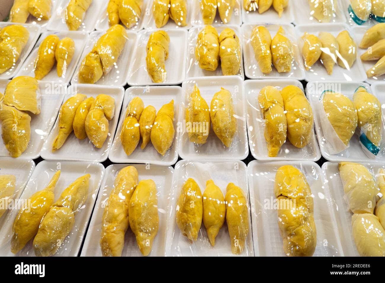 Ready to eat durians in plastic boxes . Being a fruit has the advantage ...