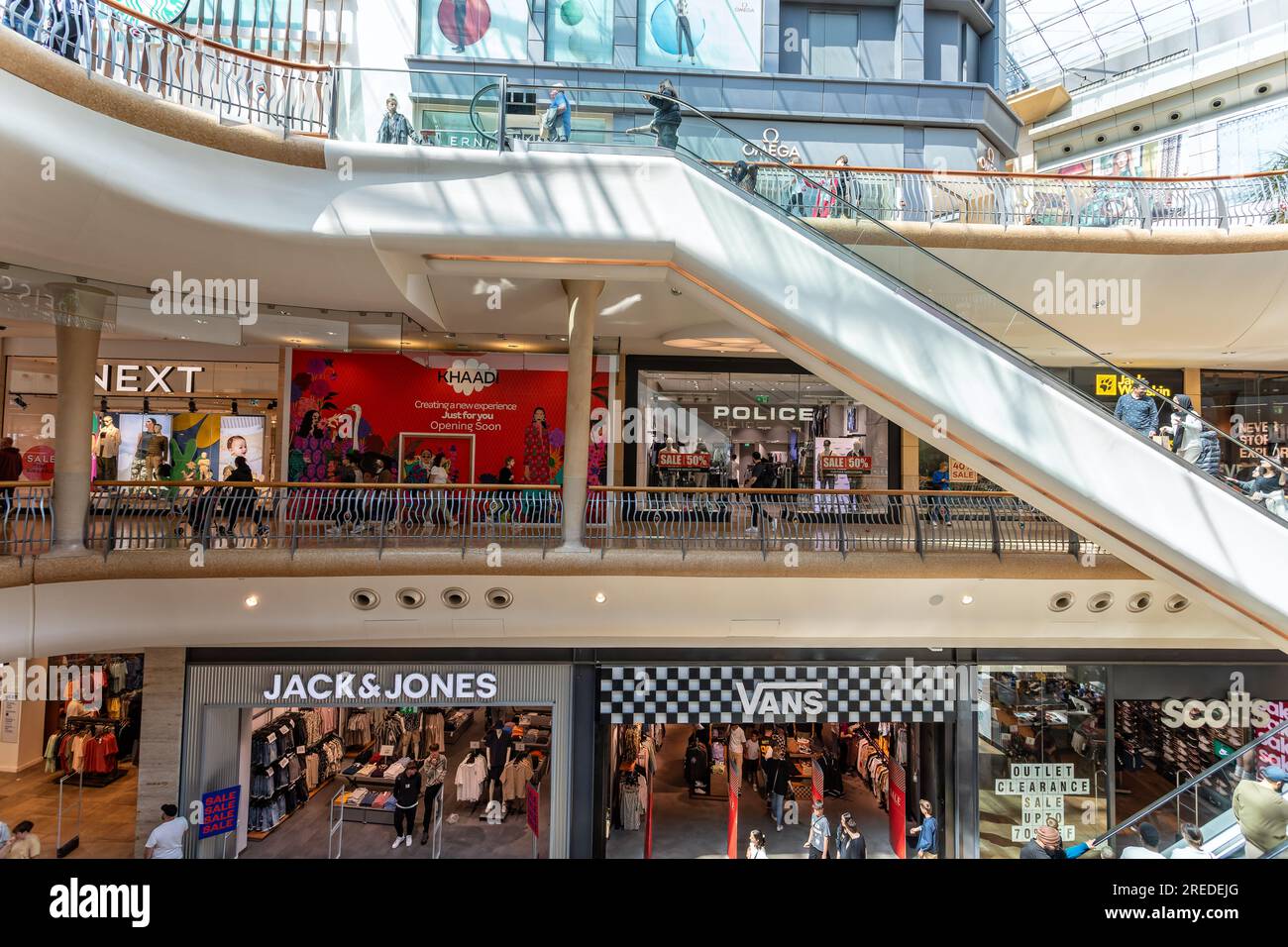 Busy scene with shoppers on escalator inside the Bullring Shopping Mall ...