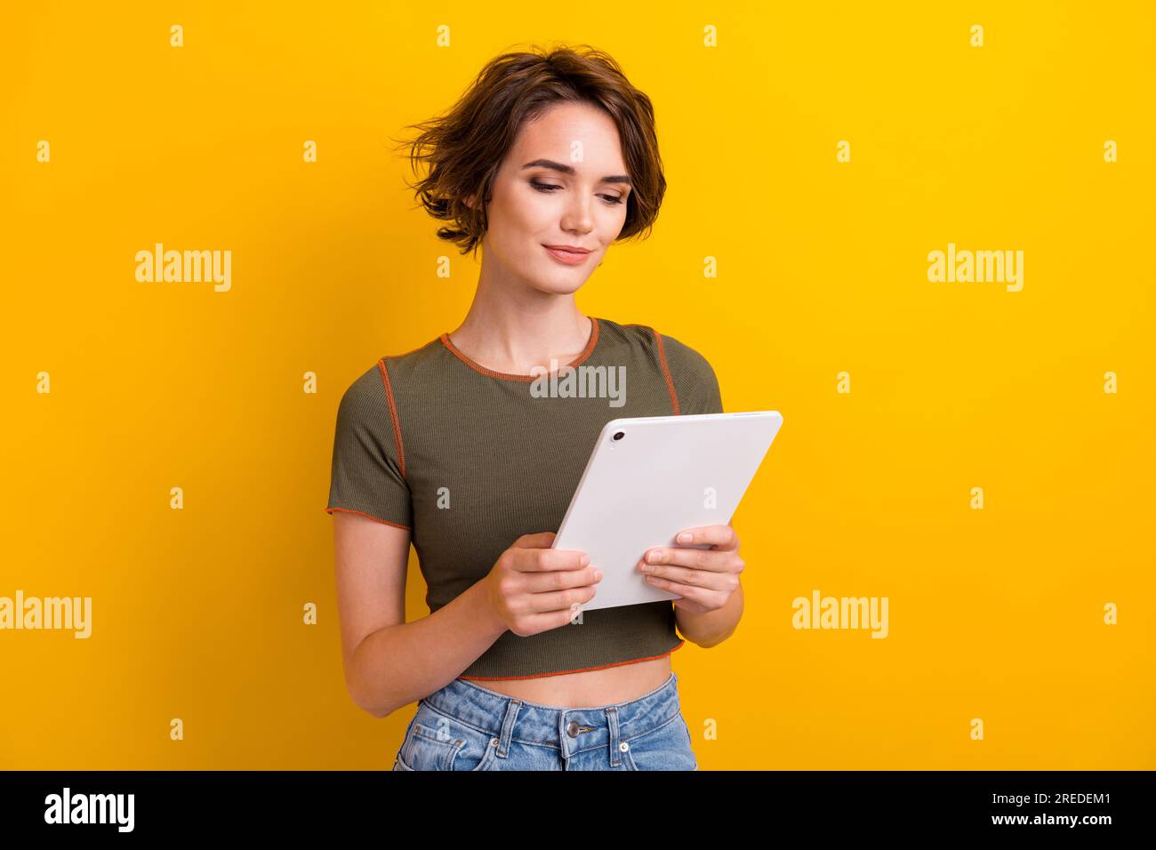 Photo of smart intelligent girl with bob hairstyle dressed khaki t ...