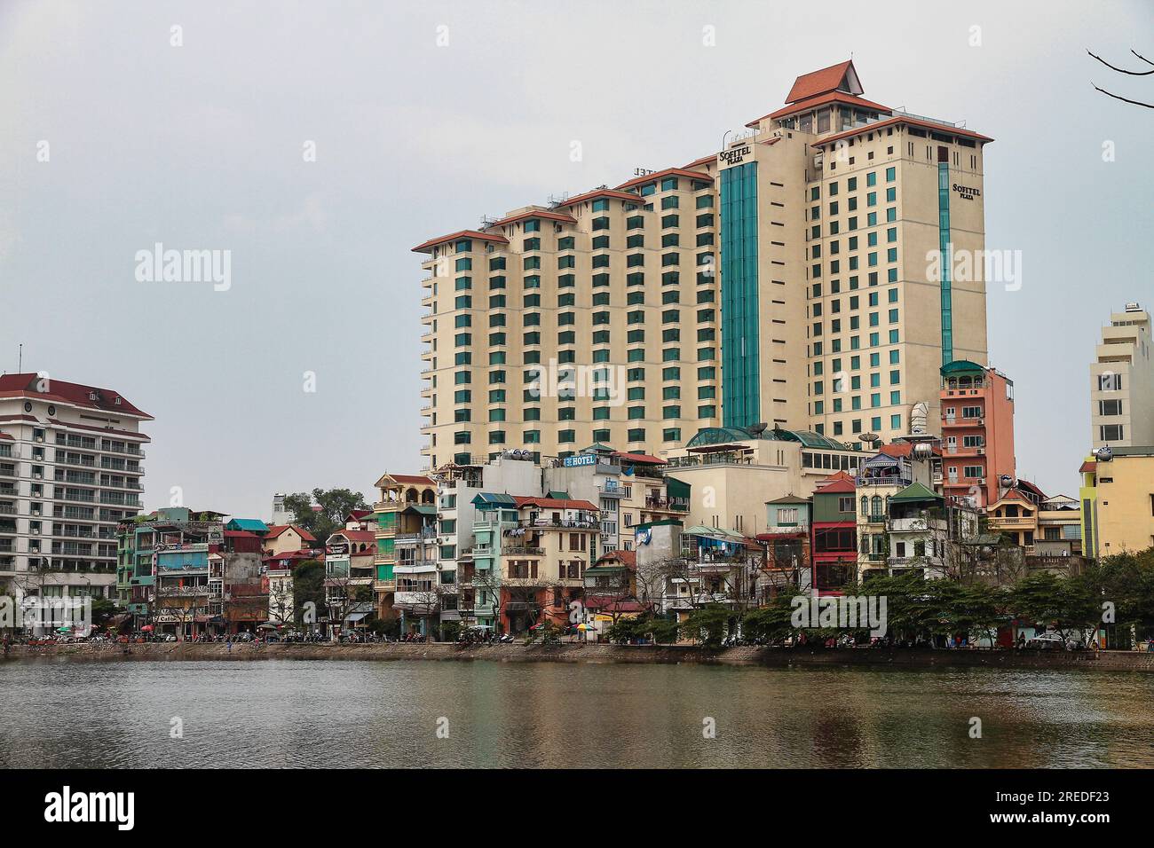 Traditional and modern buildings at the West Lake in Hanoi in Vietnam ...