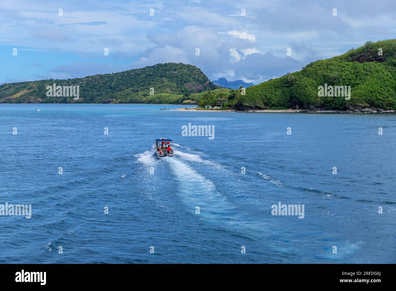 Nacula; Fiji: June 25; 2023: Group of tourists on a ship in the coast ...